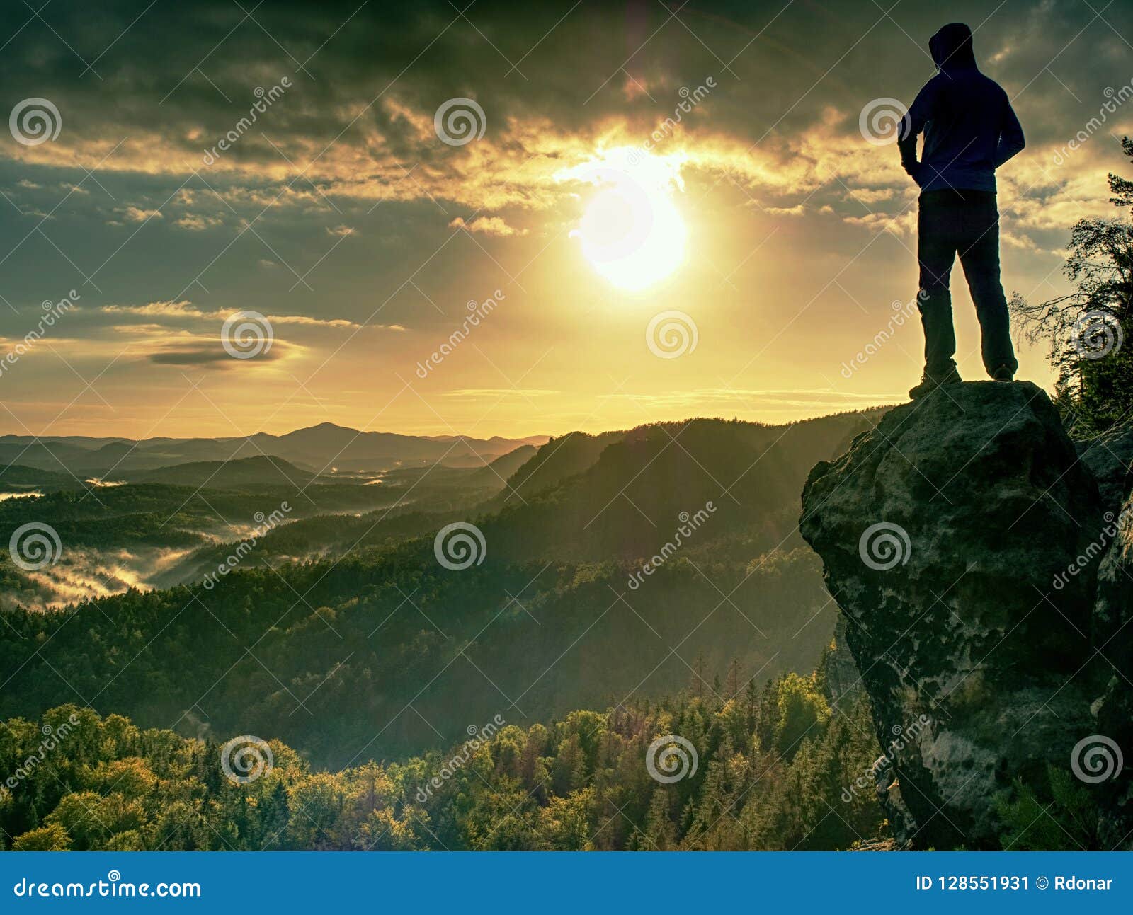 Man Walking on the Edge of a Cliff at Summit. Hrensko Range Stock Image ...