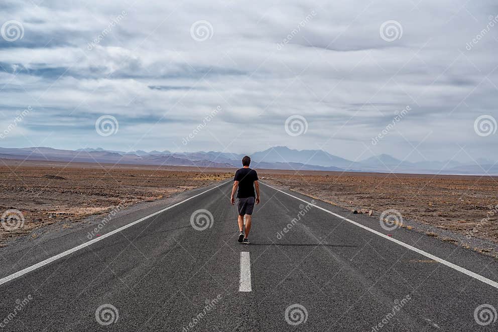 A Man Walking Forward on the Road Stock Photo - Image of countryside ...