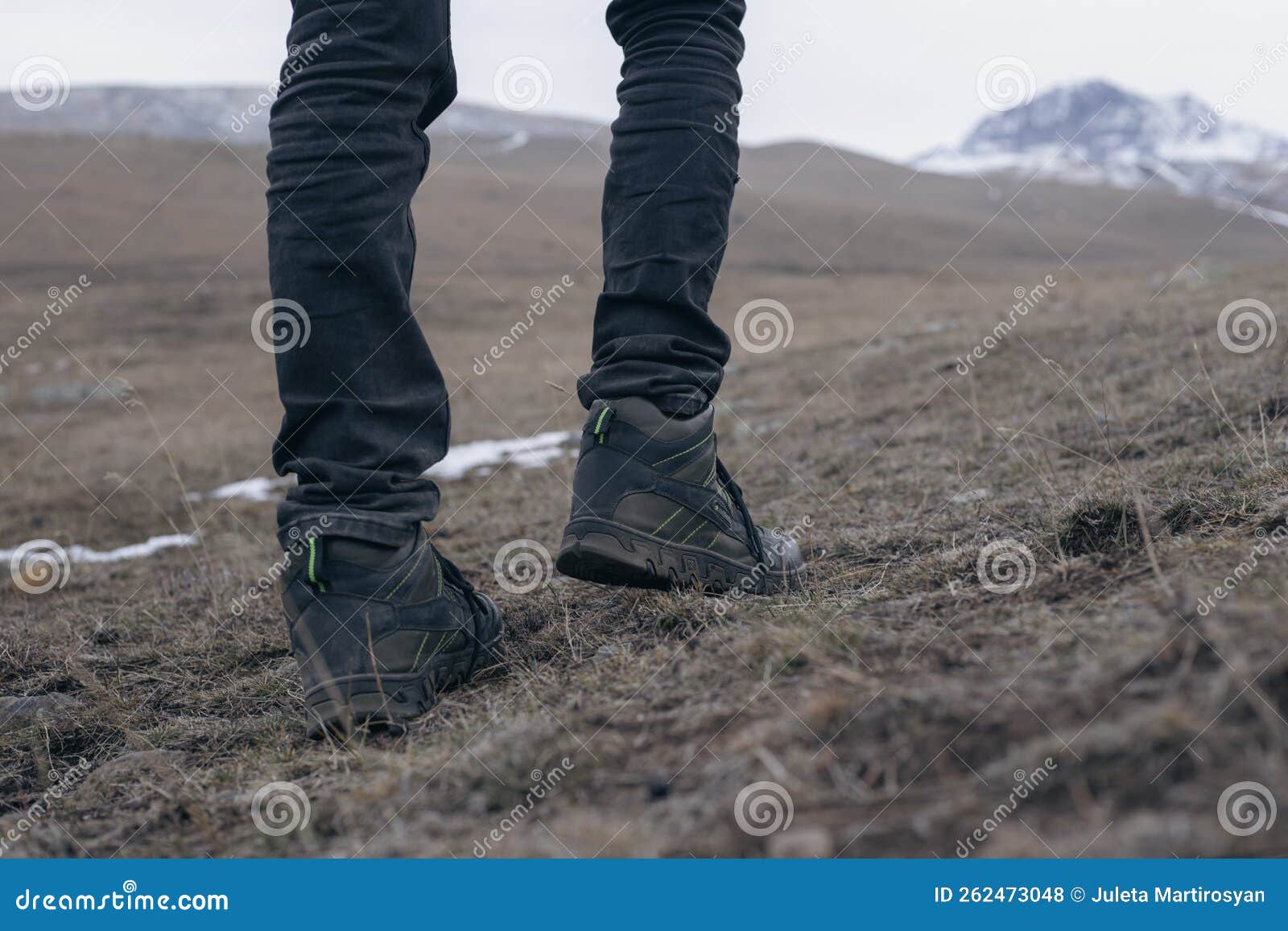 Man Walking on Hilly Terrain Stock Photo - Image of hiker, trail: 262473048