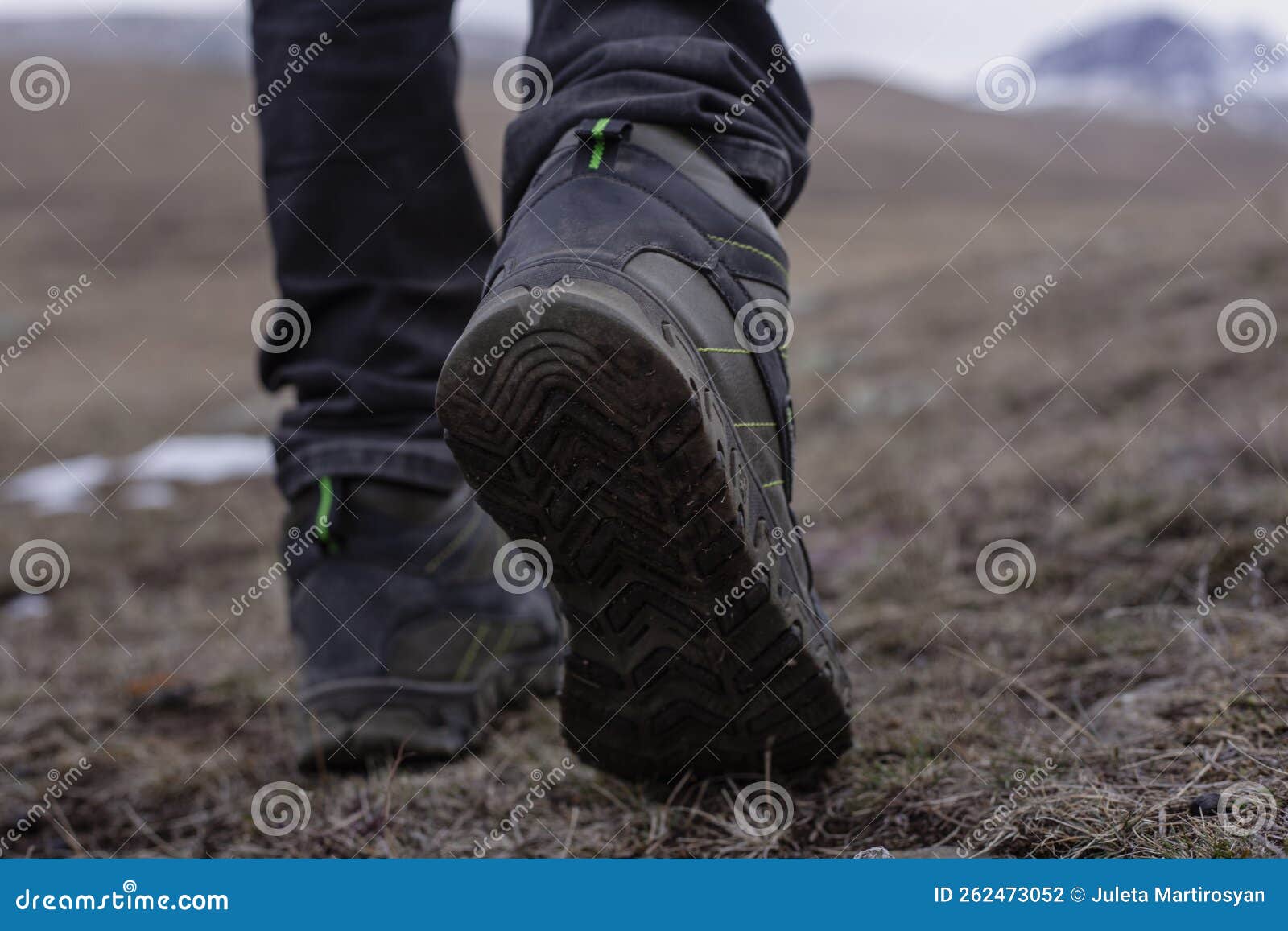 Man Walking on Hilly Terrain Stock Photo - Image of area, terrain ...