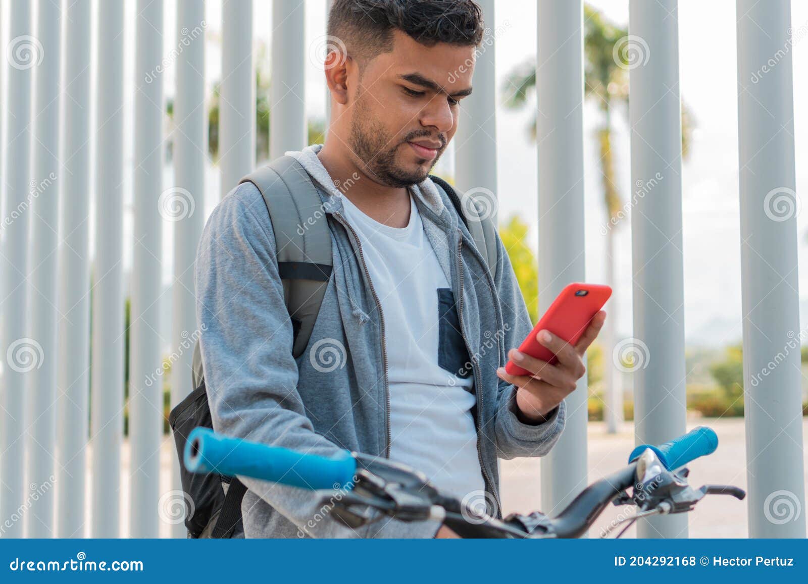 Man His Bike Checking Cell Phone Stock Photos - Free & Royalty-Free ...