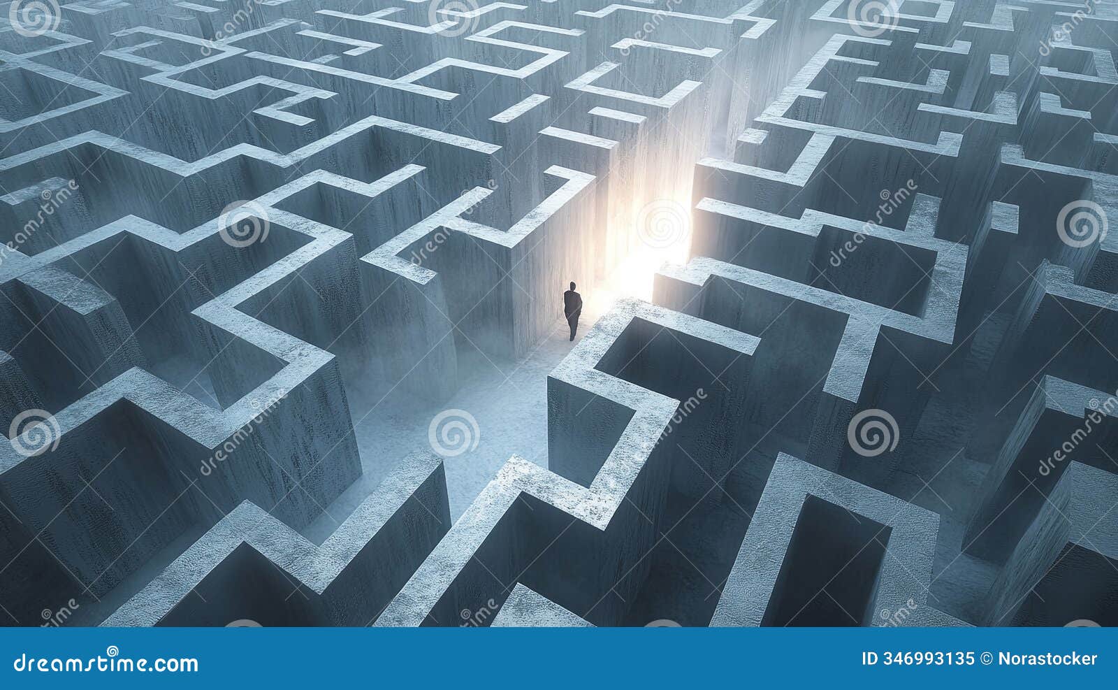 A Man is Walking through a Maze with a Light Shining through a Hole in ...