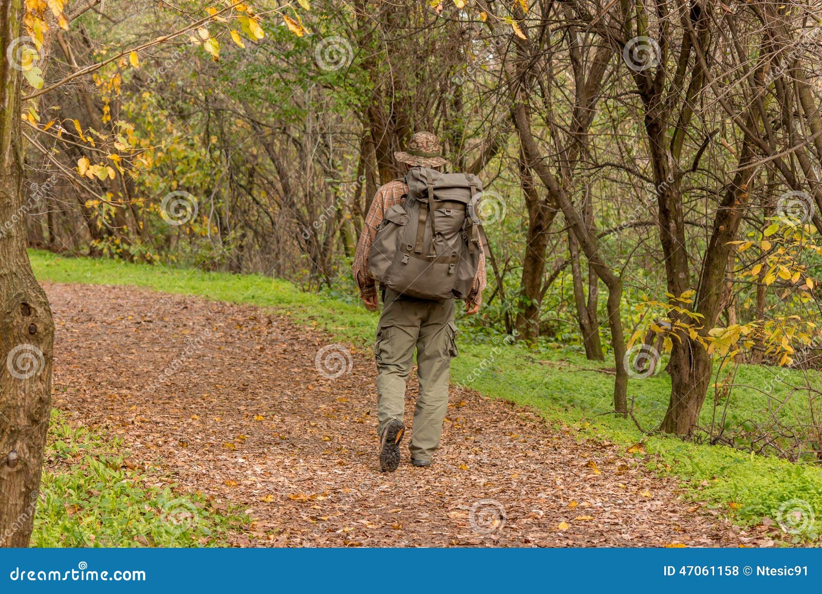 Man Walking in Nature with Backpack Stock Photo - Image of leisure ...