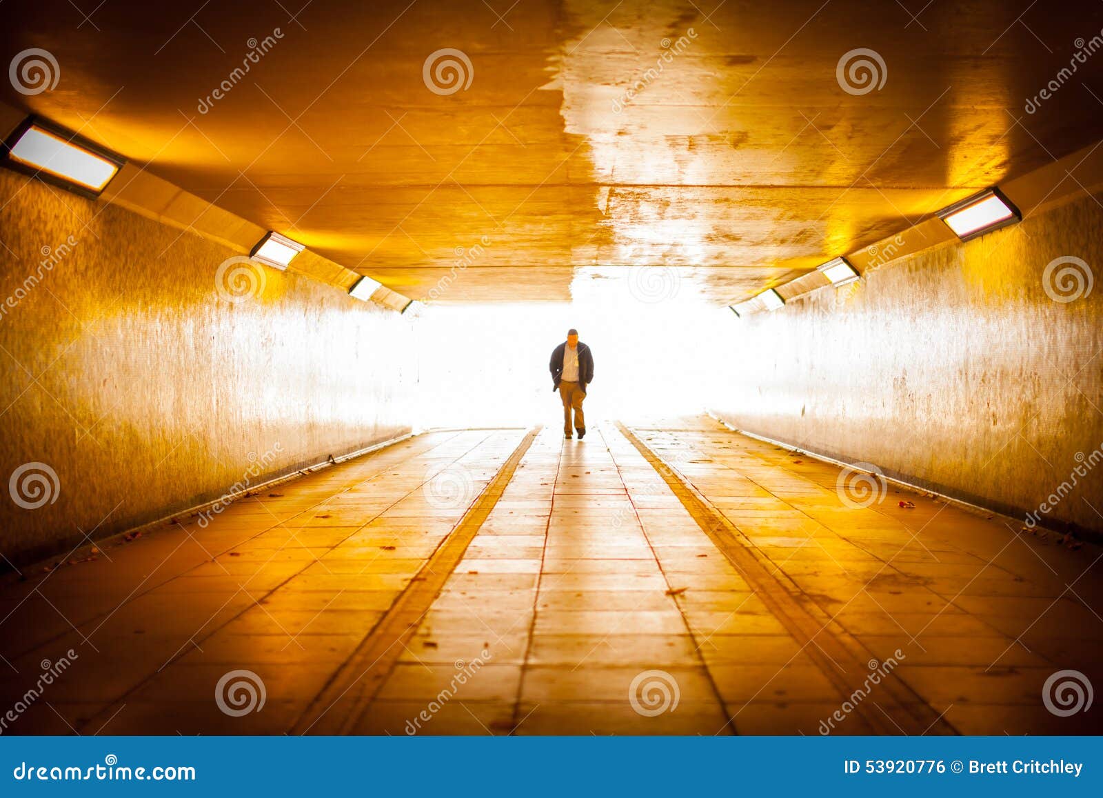 Man Walking Out of the Light Stock Photo - Image of male, darkness ...
