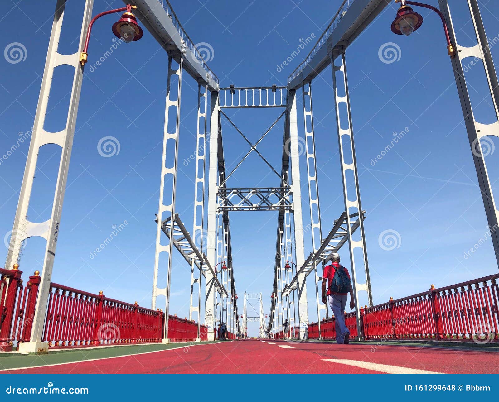 A Man Walking on a Pedestrian Bridge Stock Photo - Image of travel ...