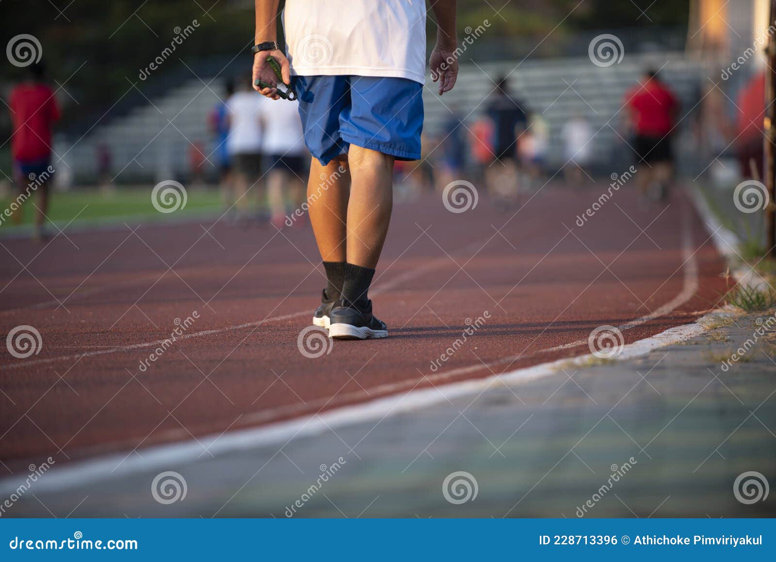 Man Walking on a Race Track during a Routine daily Workout. Stock Photo ...