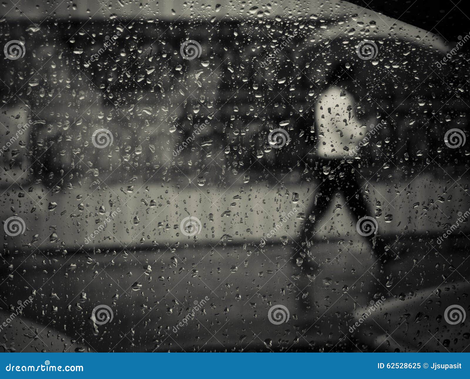 Sad Man Walking In The Rain