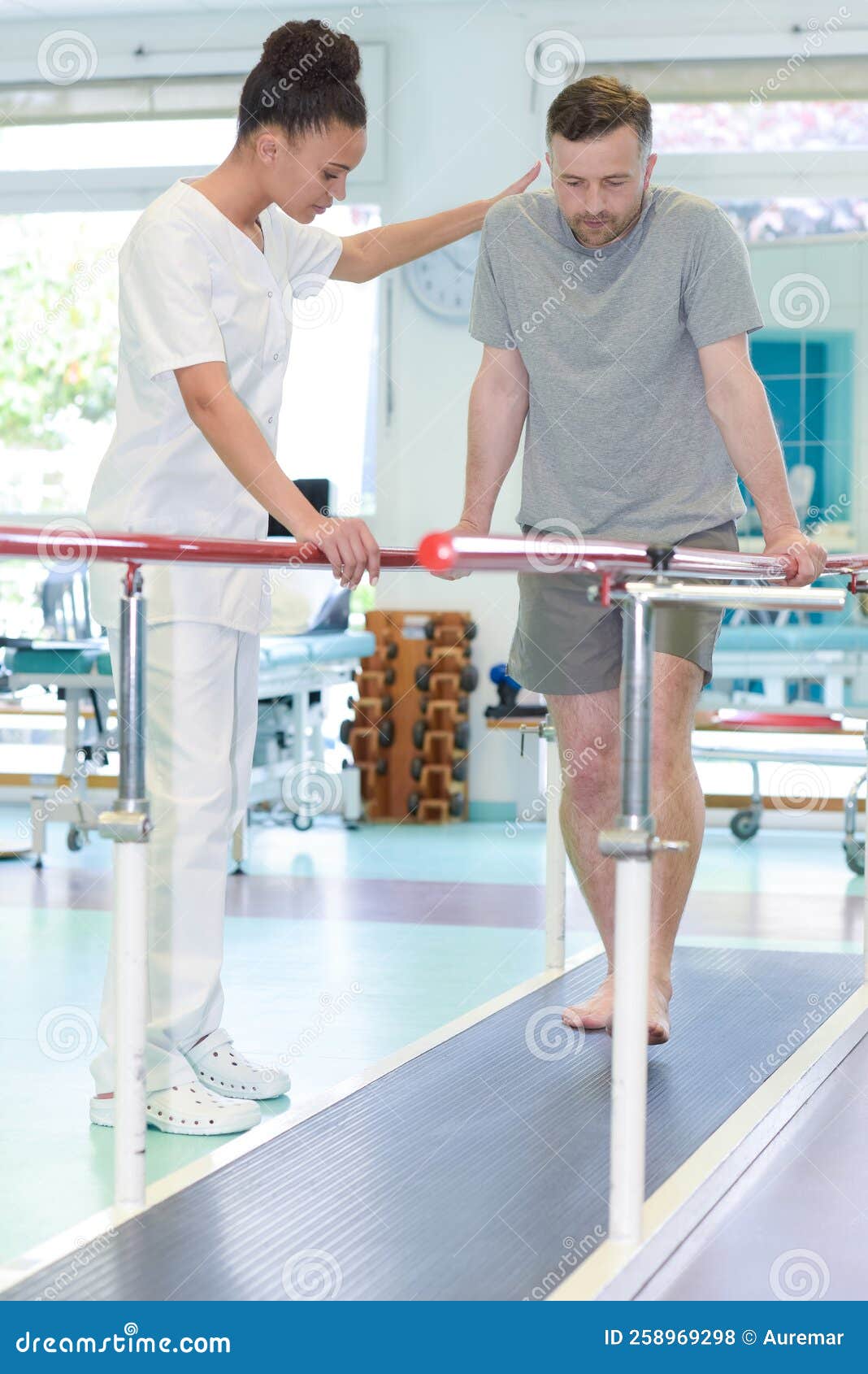 Man on Walking Rehabilitation Program Stock Photo - Image of studio, exercise: 258969298
