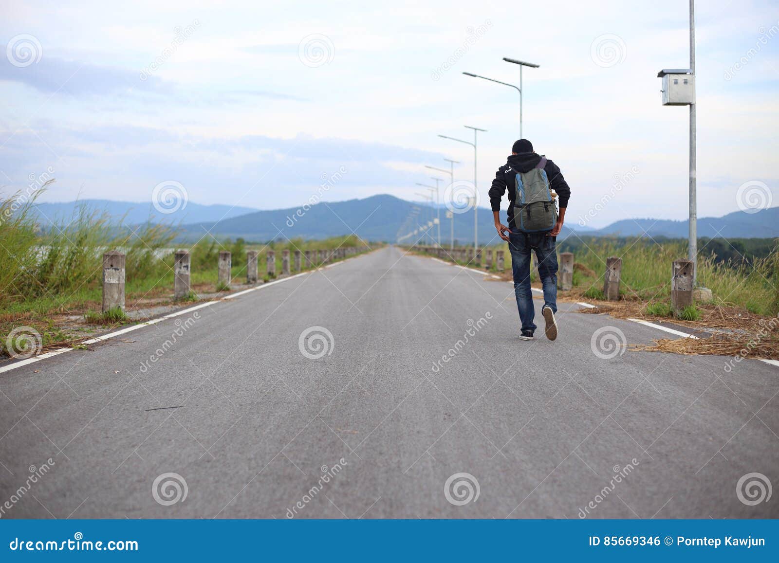Man walking on road stock photo. Image of avenue, city - 85669346