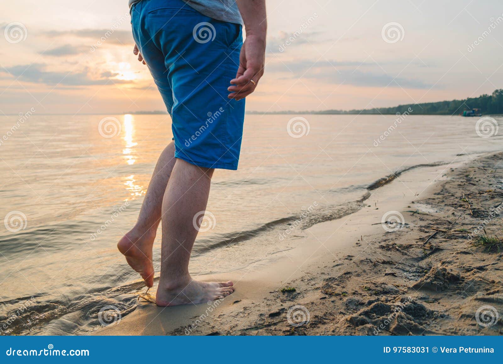 Man walking by sand beach stock image. Image of adult - 97583031
