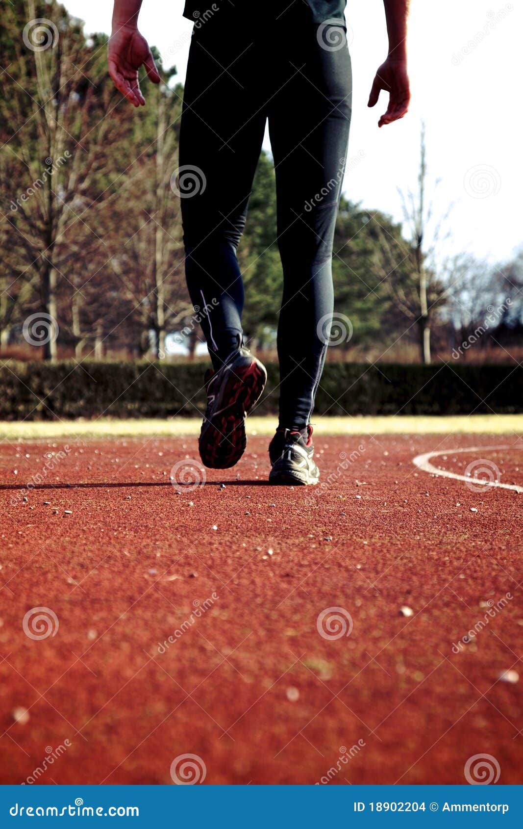 Man walking on sportstrack stock photo. Image of power - 18902204