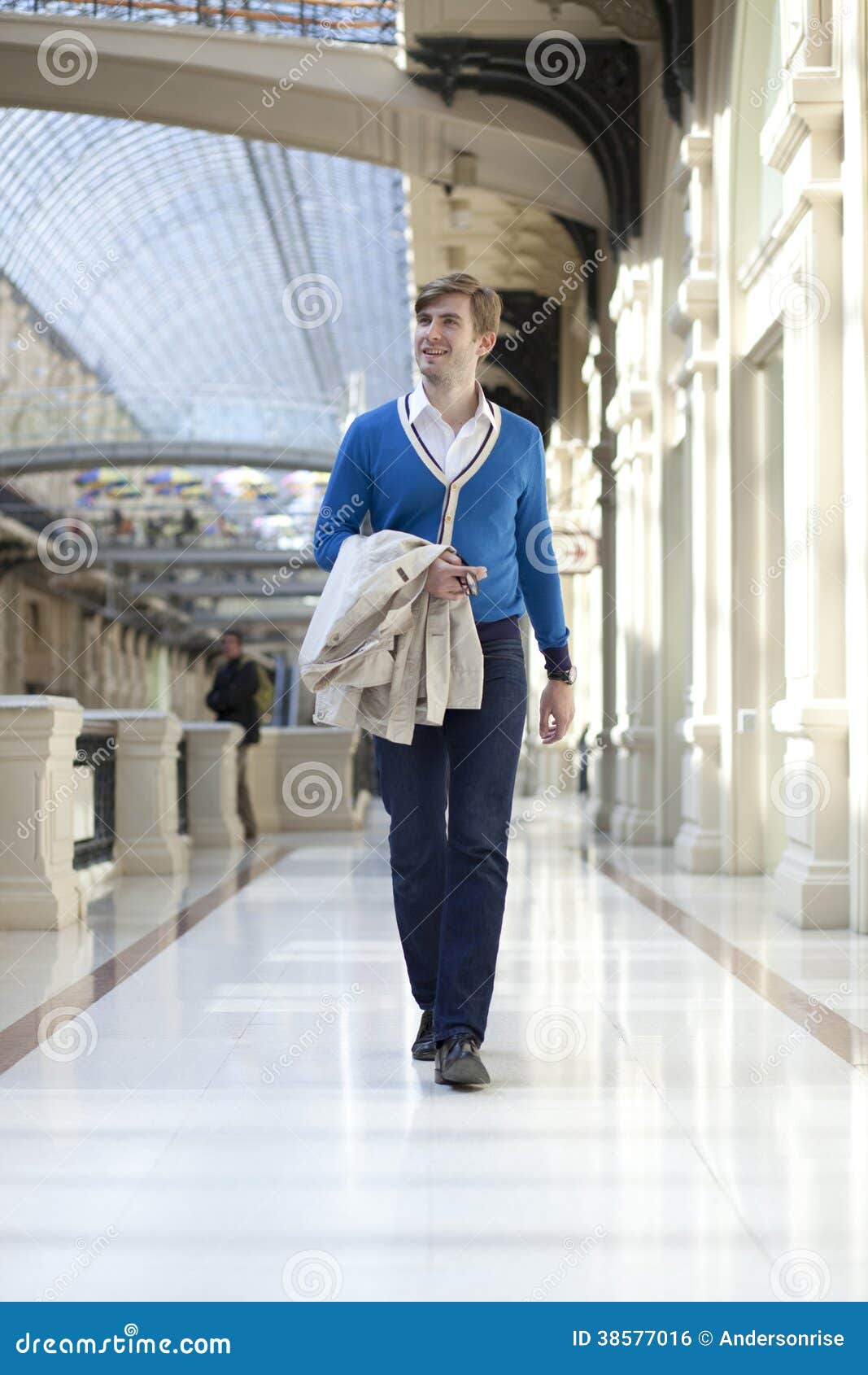 Man walking in the store stock photo. Image of satisfied - 38577016
