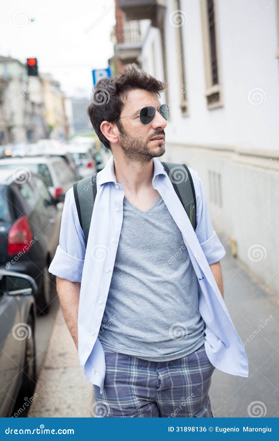 Man walking in the street stock photo. Image of stylish - 31898136