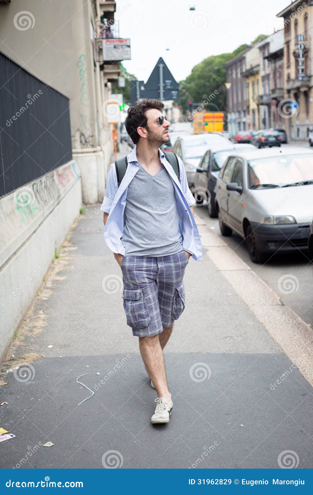 Man walking in the street stock image. Image of stylish - 31962829