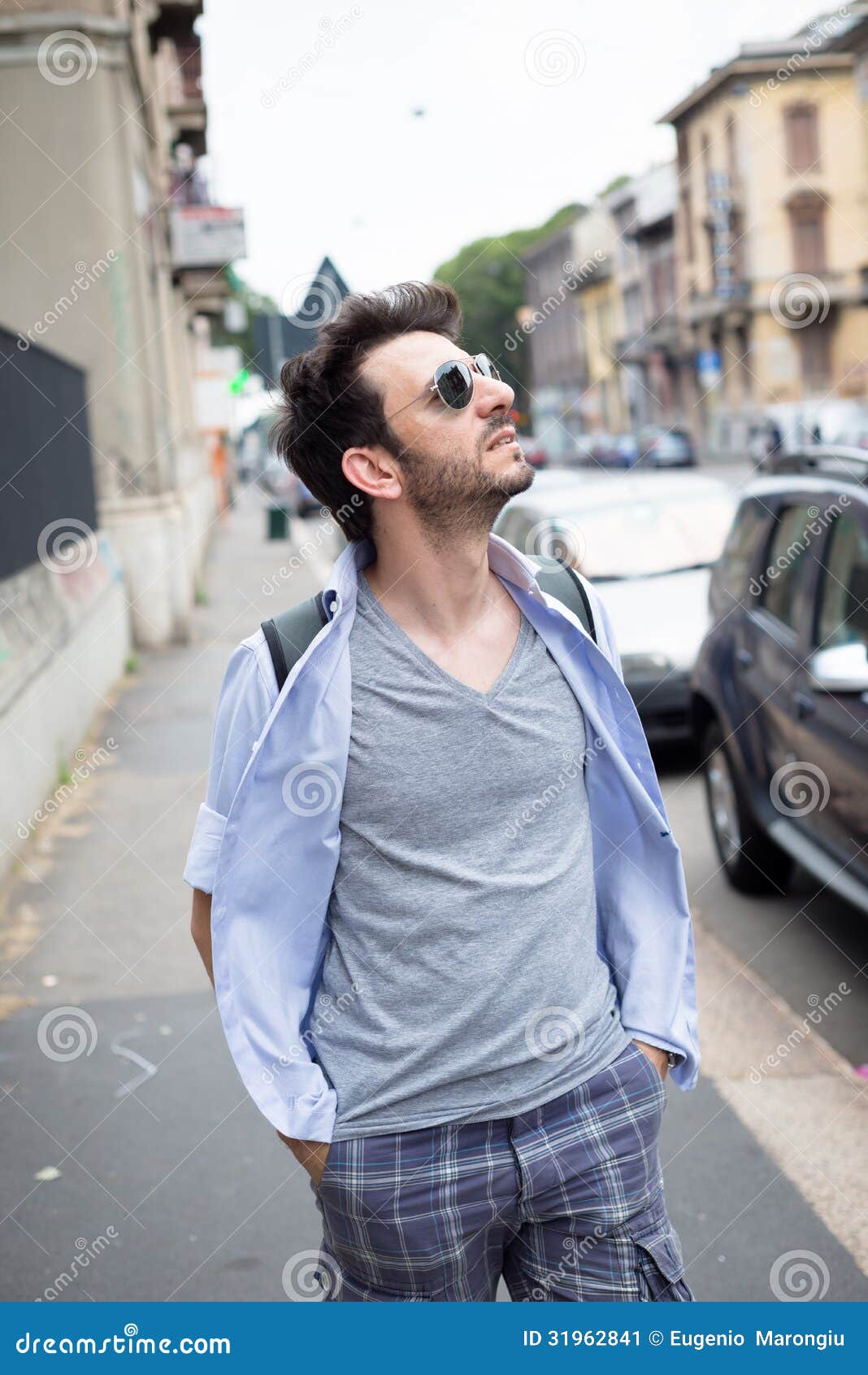 Man walking in the street stock image. Image of contemporary - 31962841