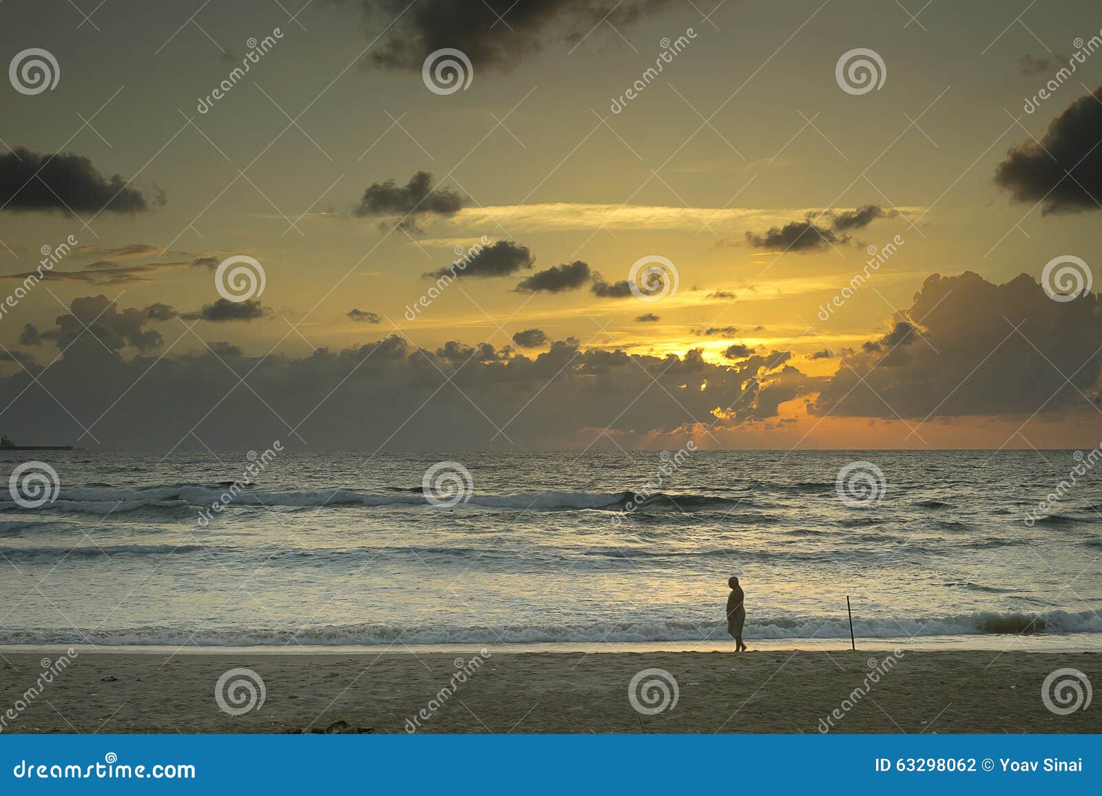 Man walking in sunset stock photo. Image of walking, lonly - 63298062