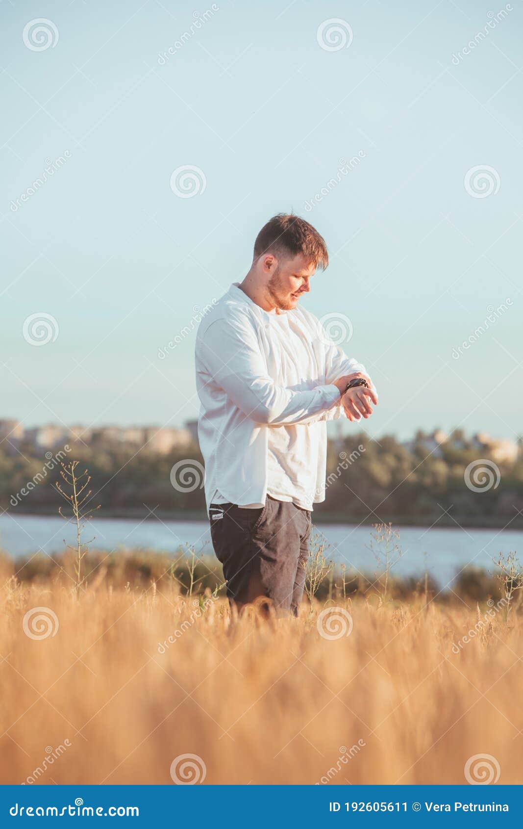 Man Walking on Sunset in Wheat Field Stock Image - Image of person ...
