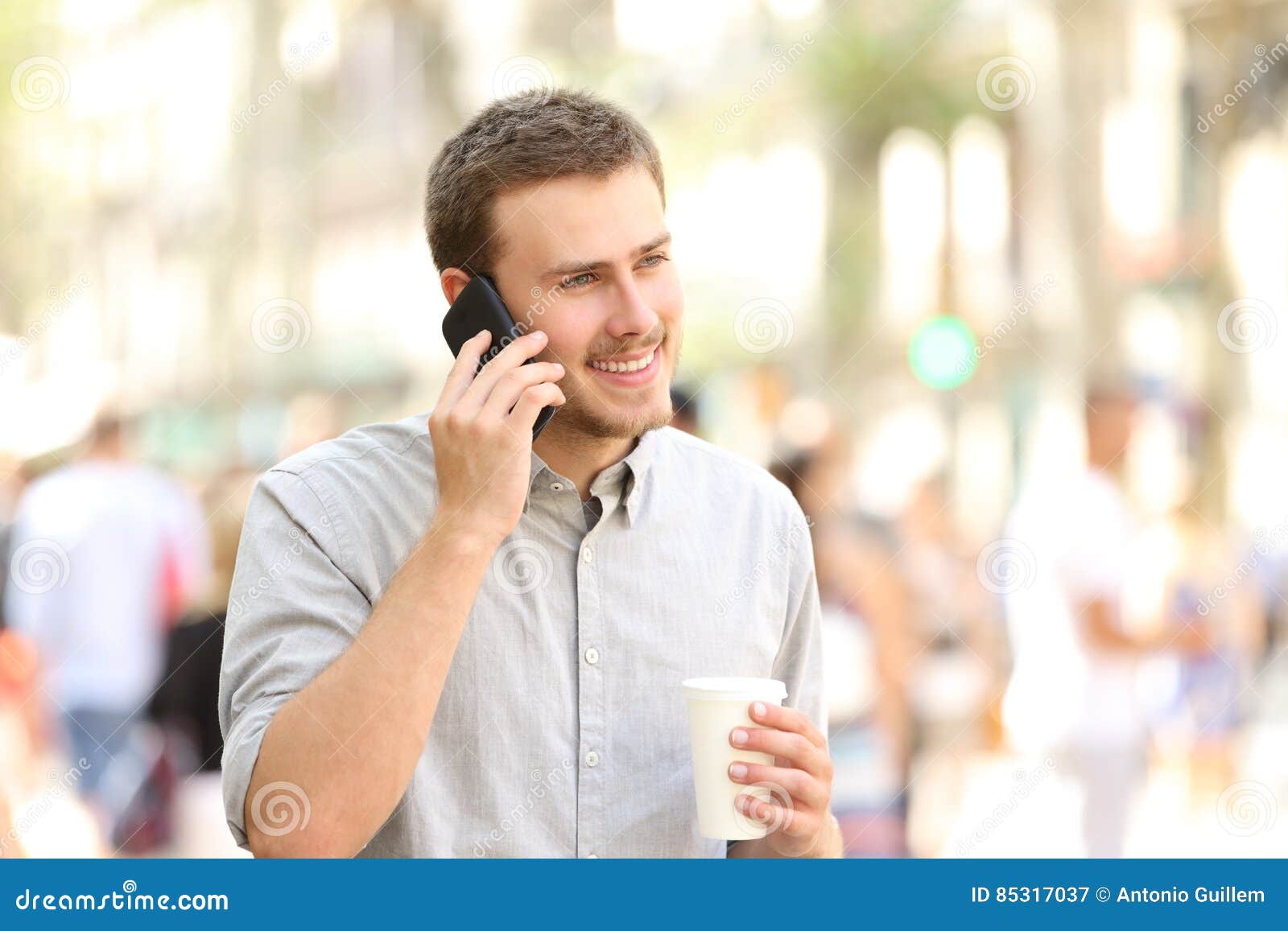 Man Walking and Talking on the Mobile Phone Stock Image - Image of ...