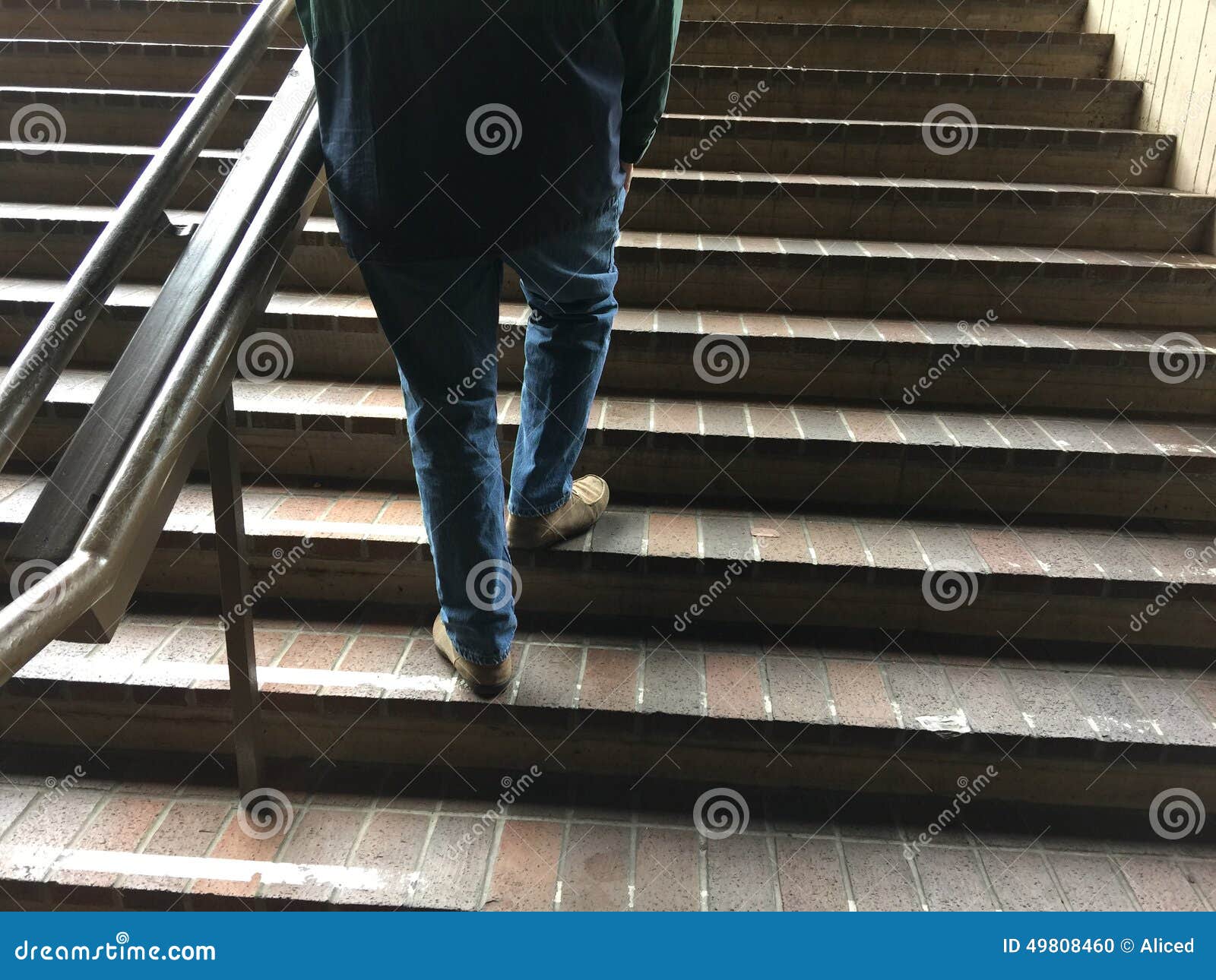 Man Walking Up Outdoor Steps Stock Photo - Image of textures, rails ...