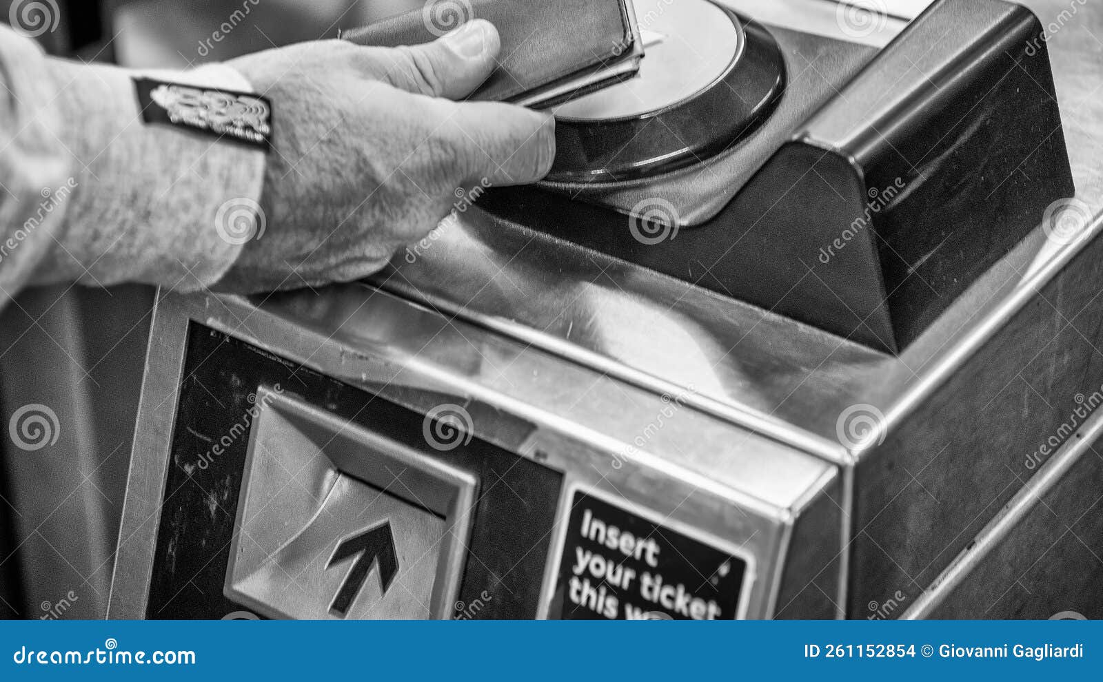 A Man Walks through the Entrance Gate of the Subway Stock Photo - Image ...