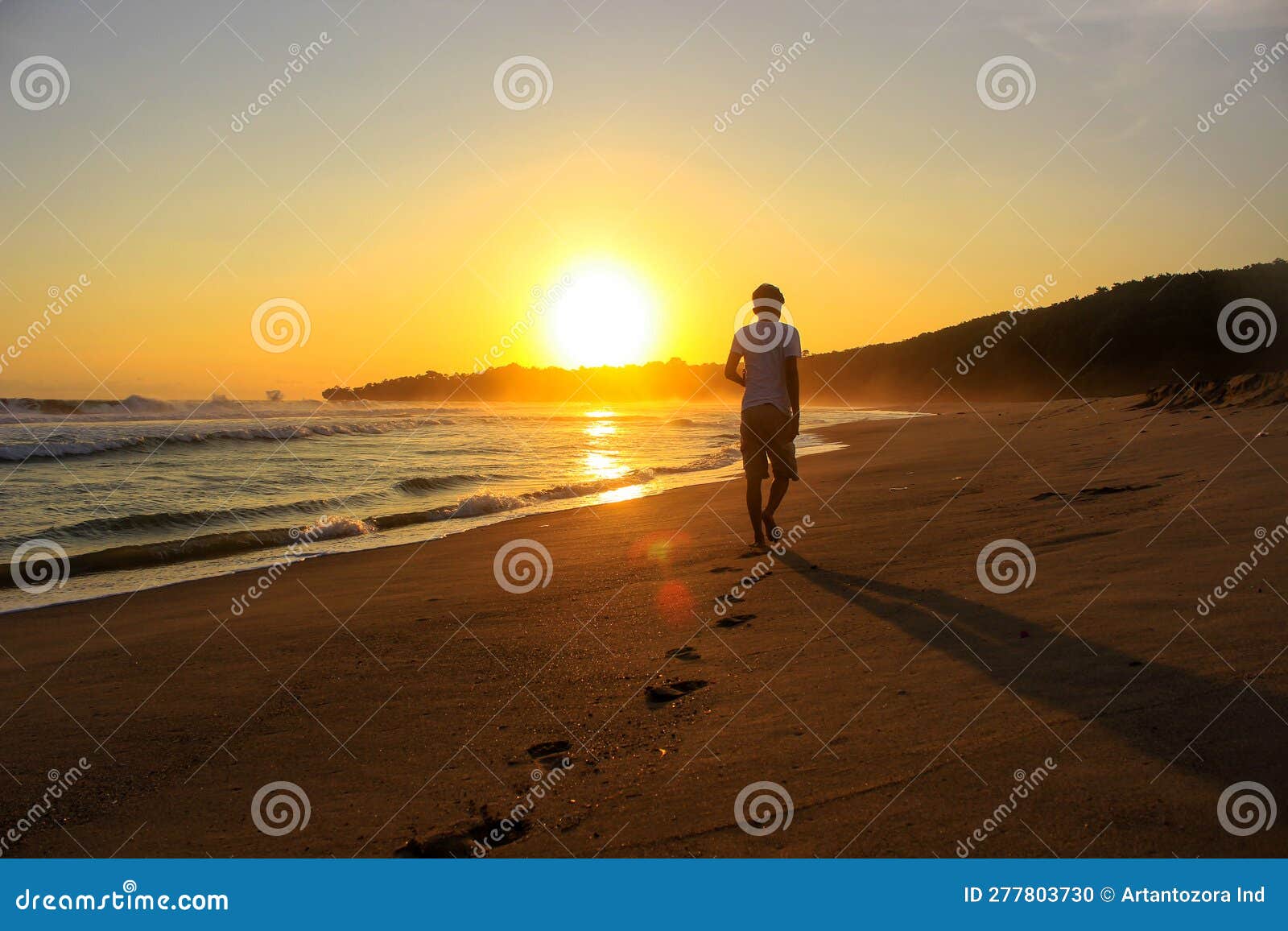 A Man Walks Toward the Setting Sun Stock Photo - Image of lifestyle ...