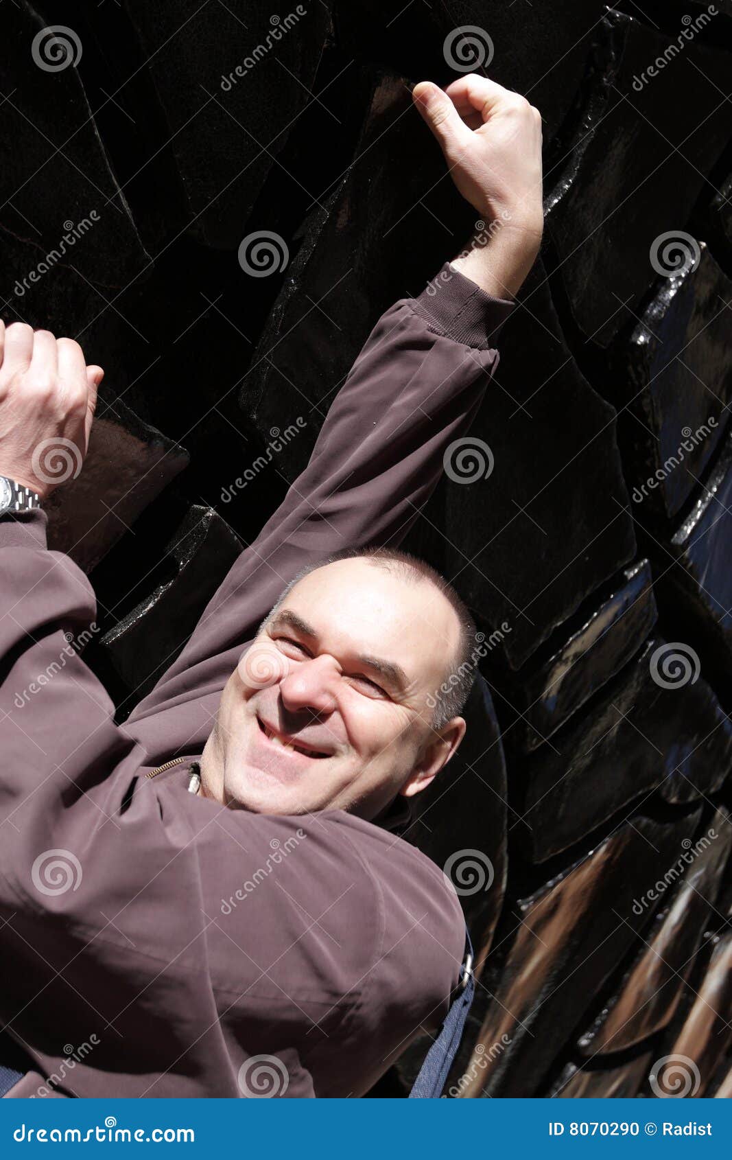 Man and wall stock photo. Image of look, riot, human, smile - 8070290