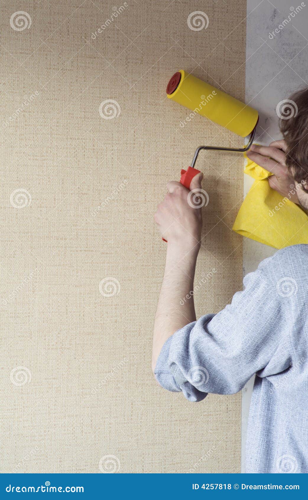Man wallpapering stock photo. Image of rear, worker, space - 4257818