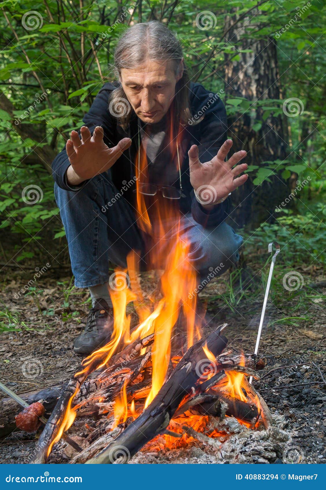 Man is Warming His Hands at the Fire Stock Photo - Image of long ...