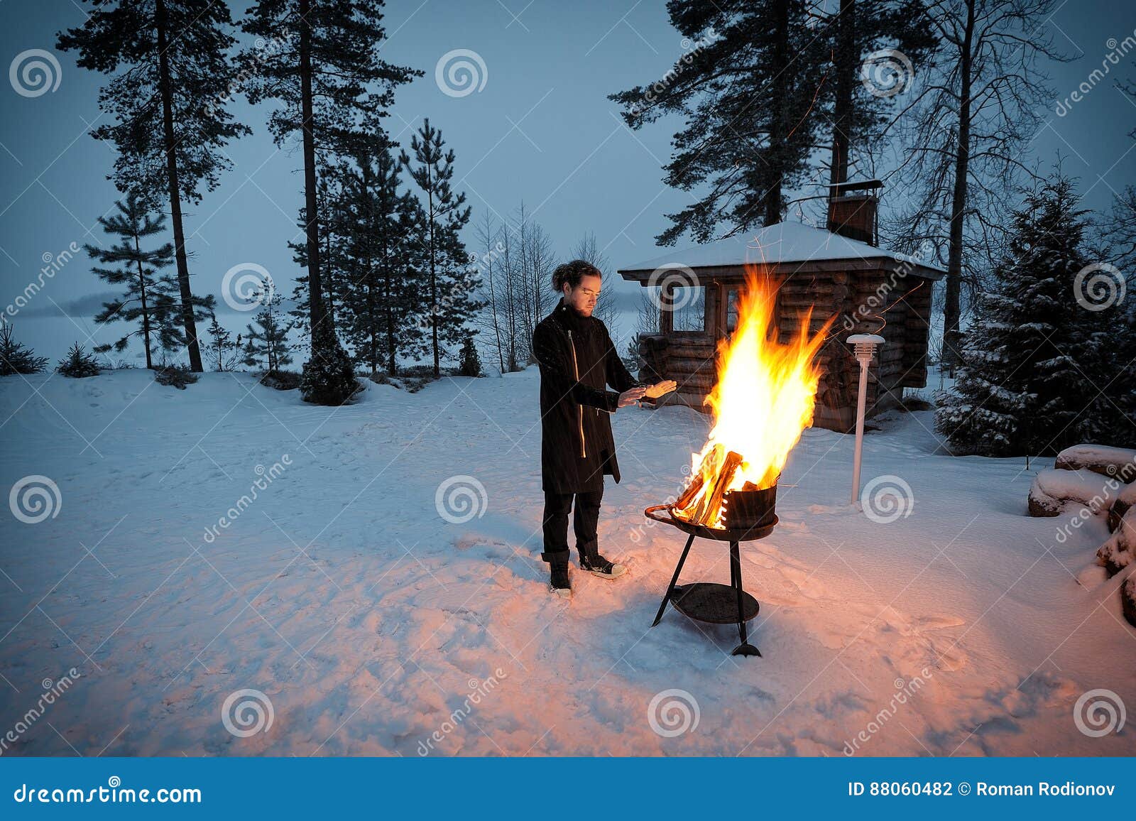 Man Warms Himself by the Fire Stock Photo - Image of lifestyle, bask ...