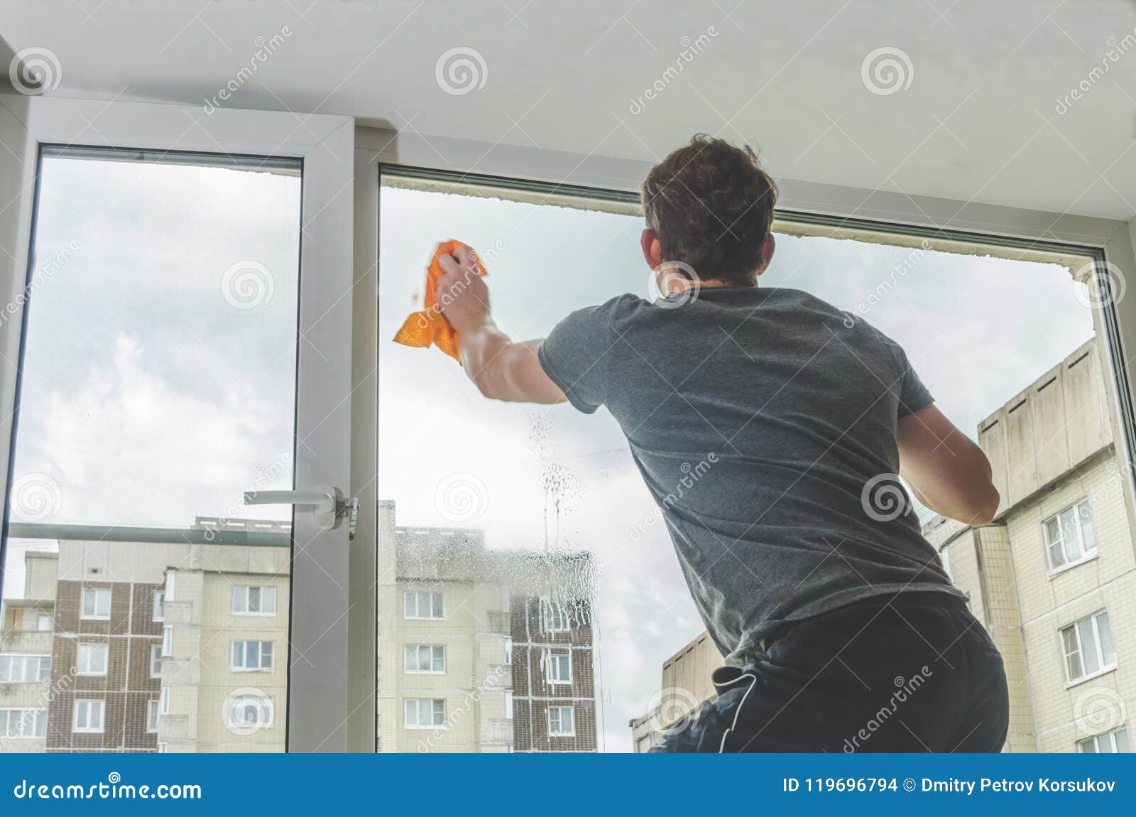 Man wash Windows stock photo. Image of detergent, chores - 119696794