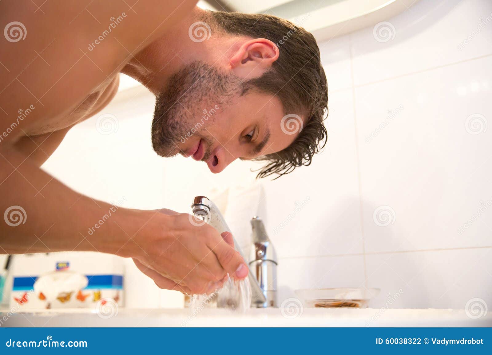 Man washes in bathroom stock photo. Image of caucasian - 60038322