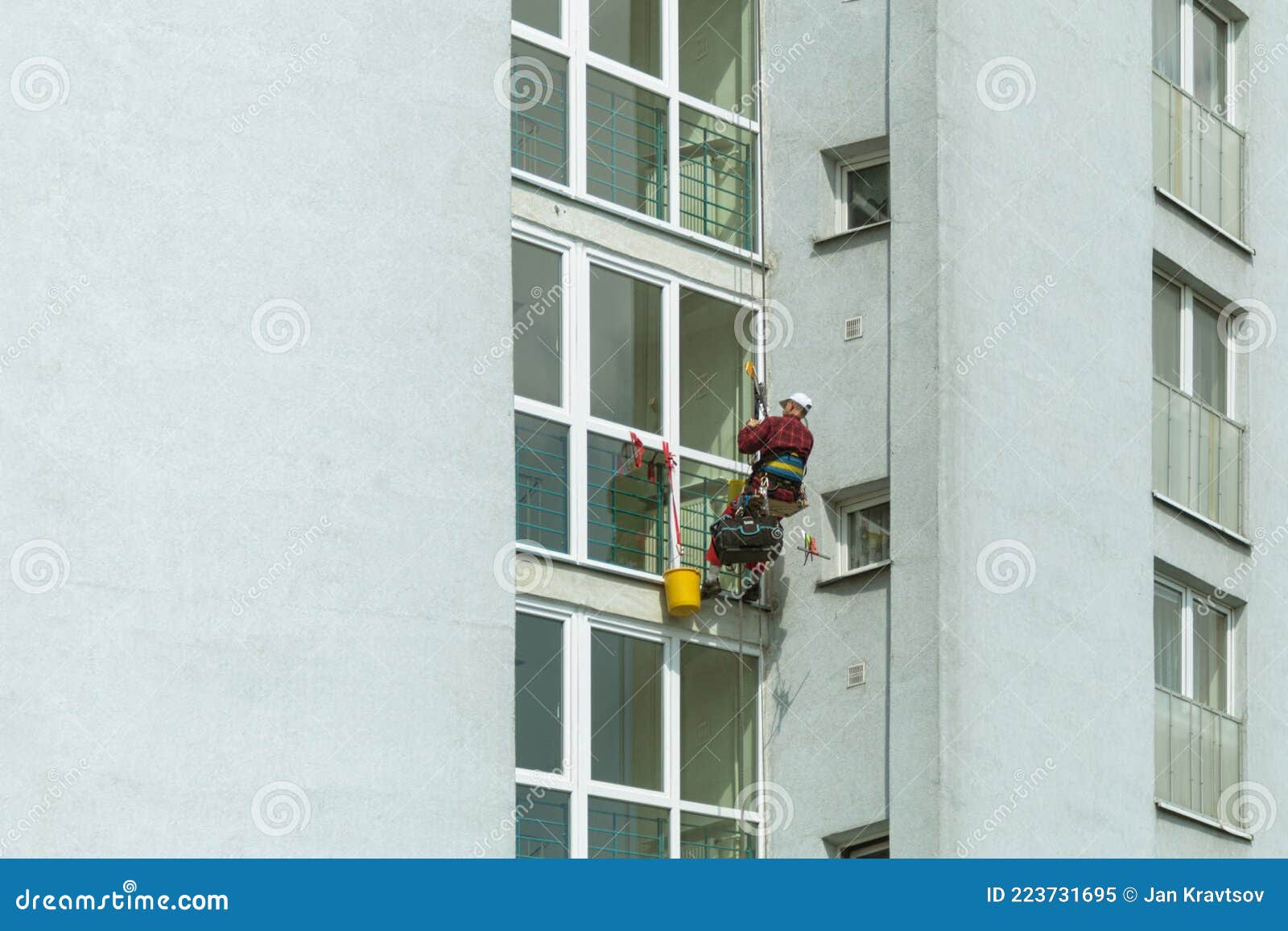 A Man Washes Windows in a Multi-storey Building Stock Image - Image of ...