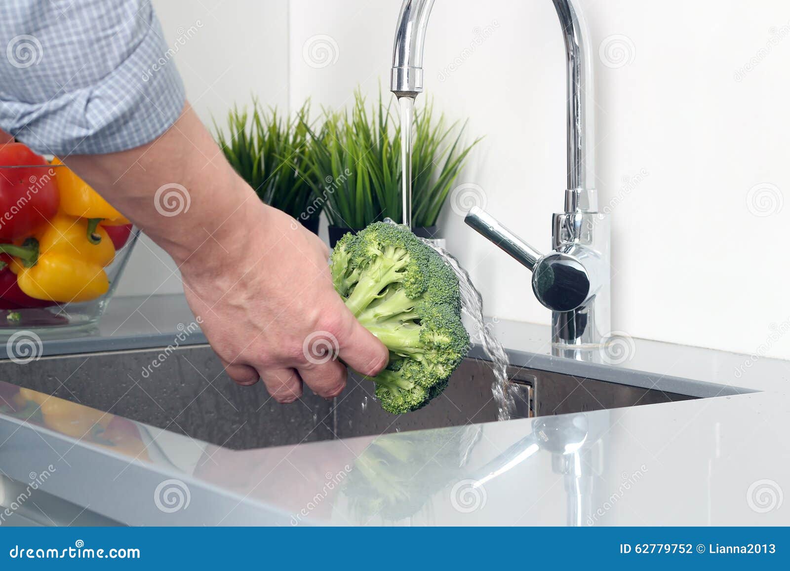 Man Washing Broccoli with Water in Kitchen Stock Photo - Image of ...