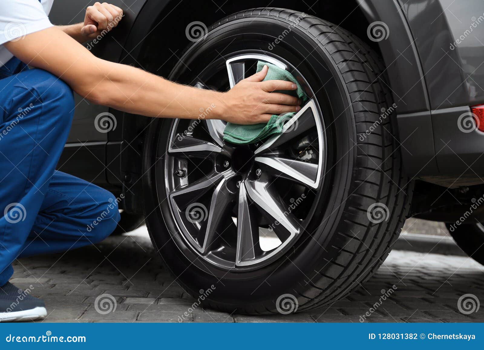 Man Washing Car Wheel with Rag Stock Photo - Image of hand, detail ...