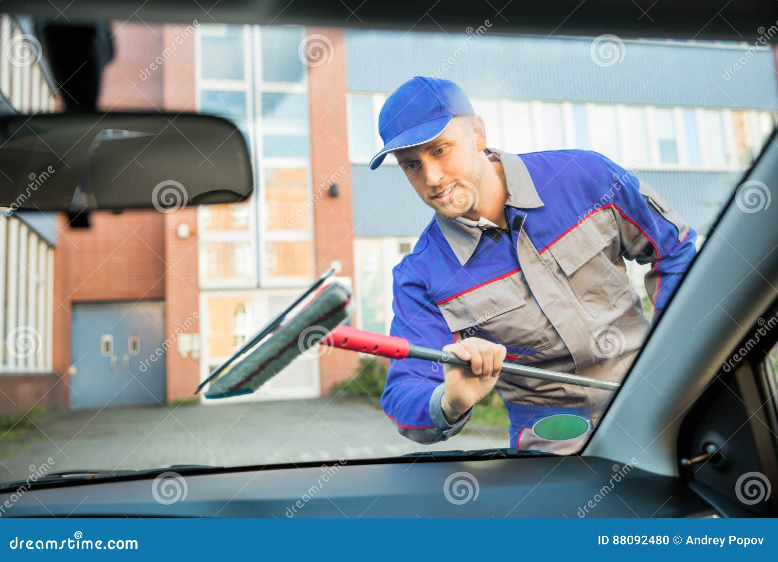 Man Washing Car Window with Mop Stock Photo - Image of people ...