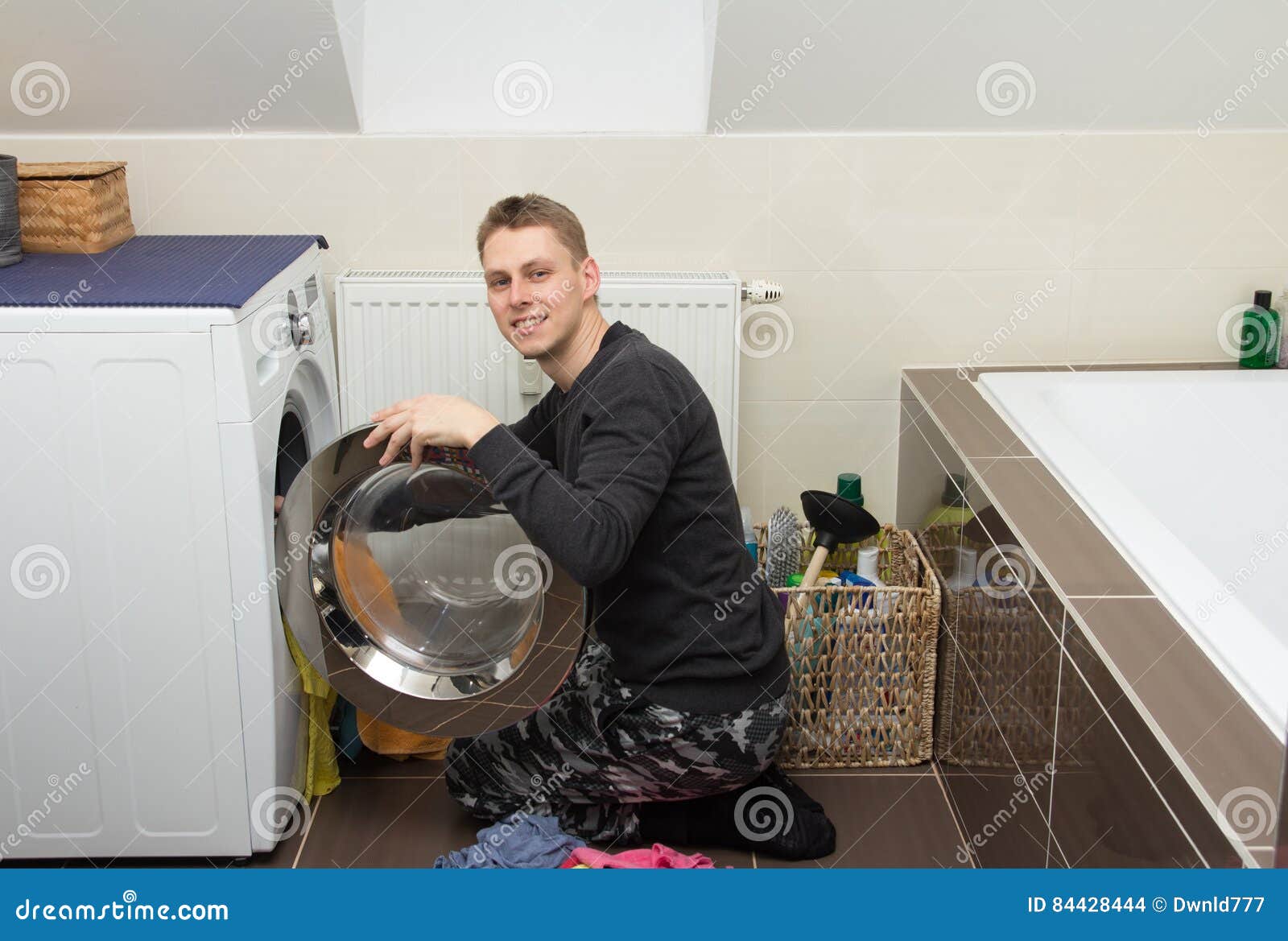 Man washing clothes stock photo. Image of design, clean - 84428444