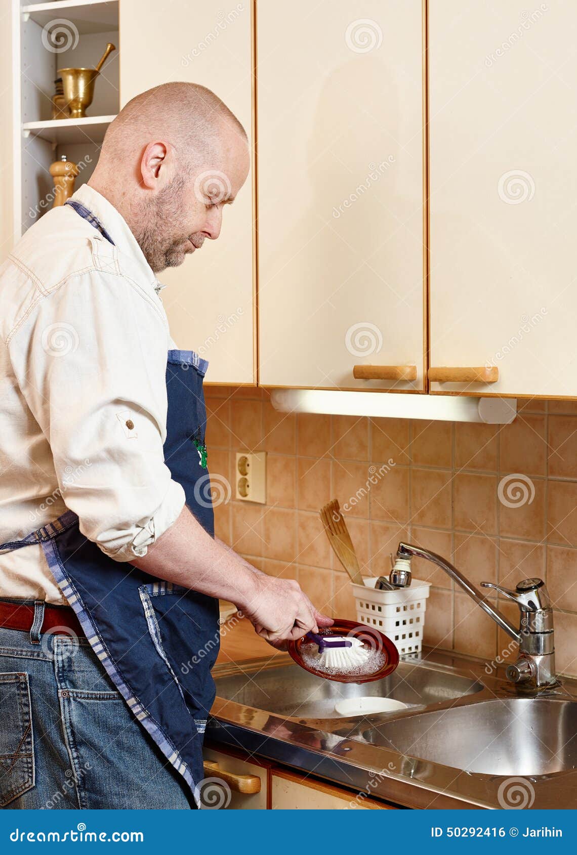 Man washing a dishes stock photo. Image of homelike, beard - 50292416