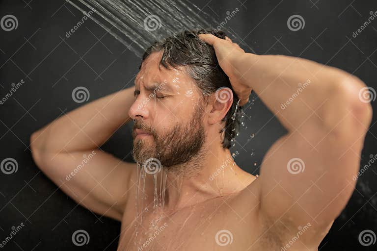 Man Washing Hair In Bathroom Guy Bathing Shower Head In Bathtub Male