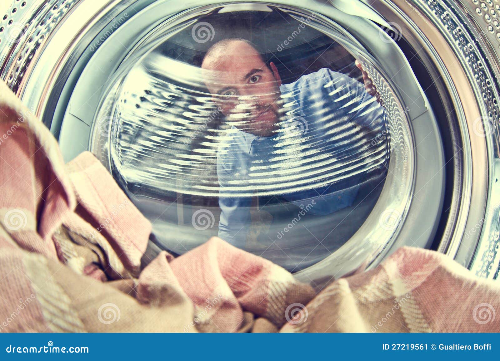 Man and washing machine stock image. Image of dryer, holding - 27219561