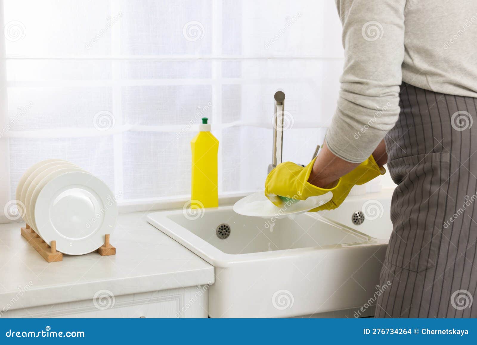 Man Washing Plate Above Sink in Kitchen, Closeup Stock Photo - Image of ...