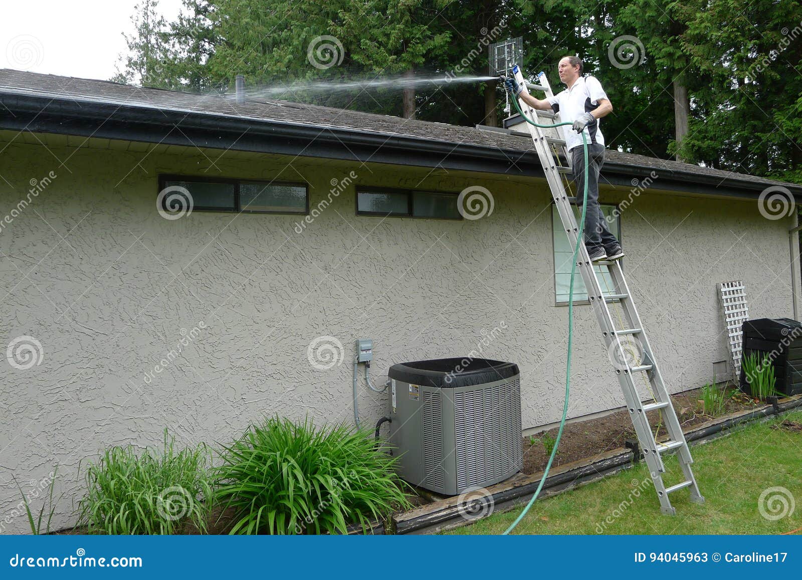 Washing the Roof Gutter stock image. Image of roof, ladder - 94045963