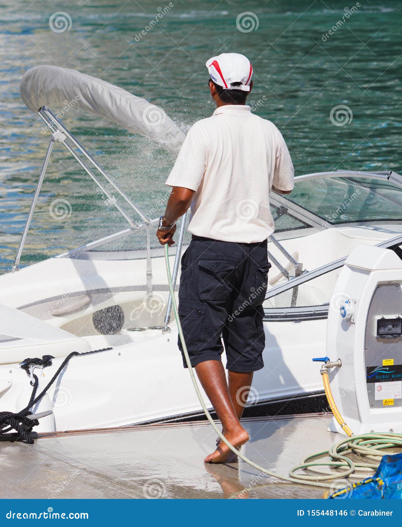 Man washing a yacht editorial photo. Image of port, equipment - 155448146