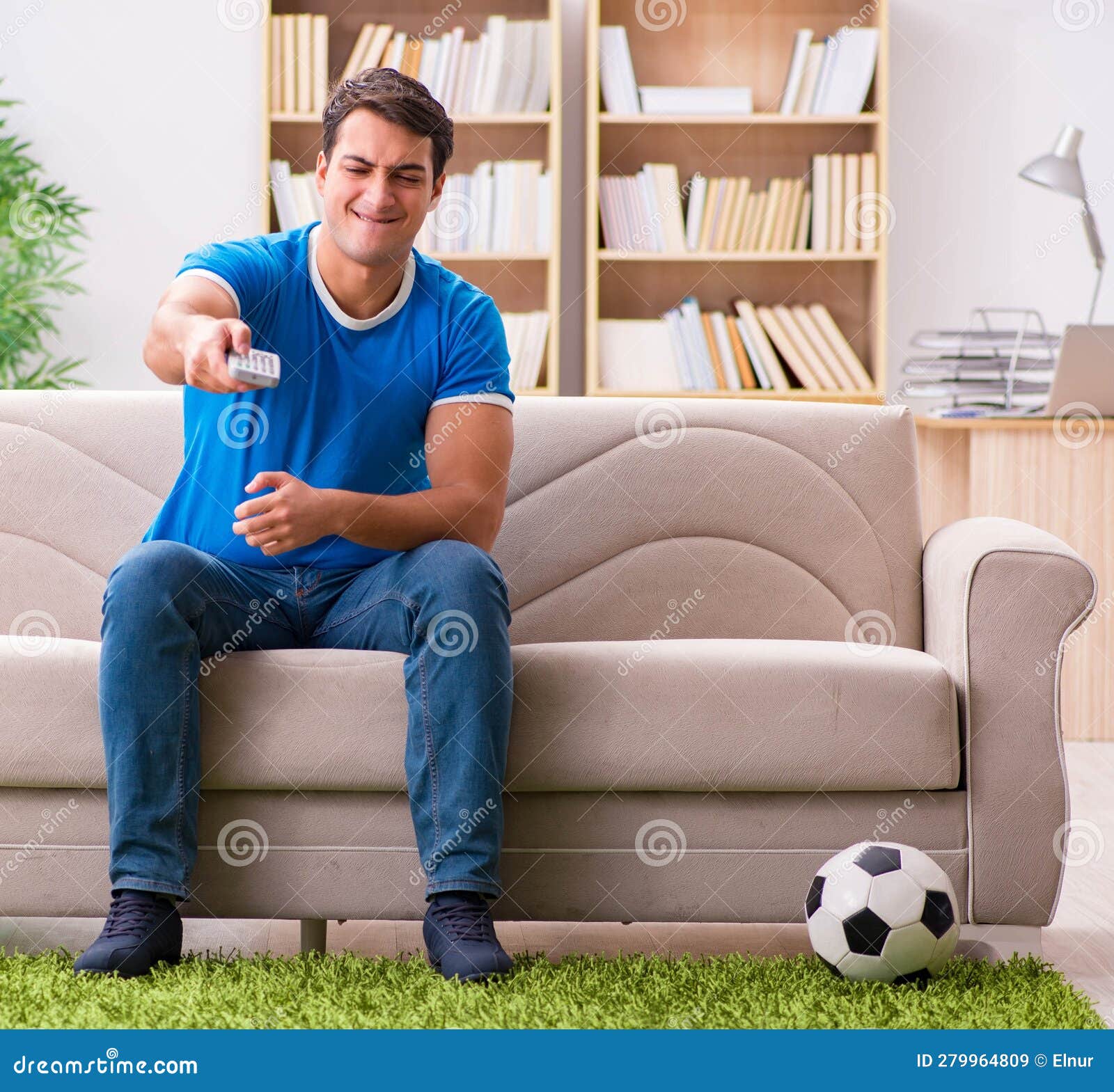 Man Watching Football at Home Sitting in Couch Stock Image - Image of ...