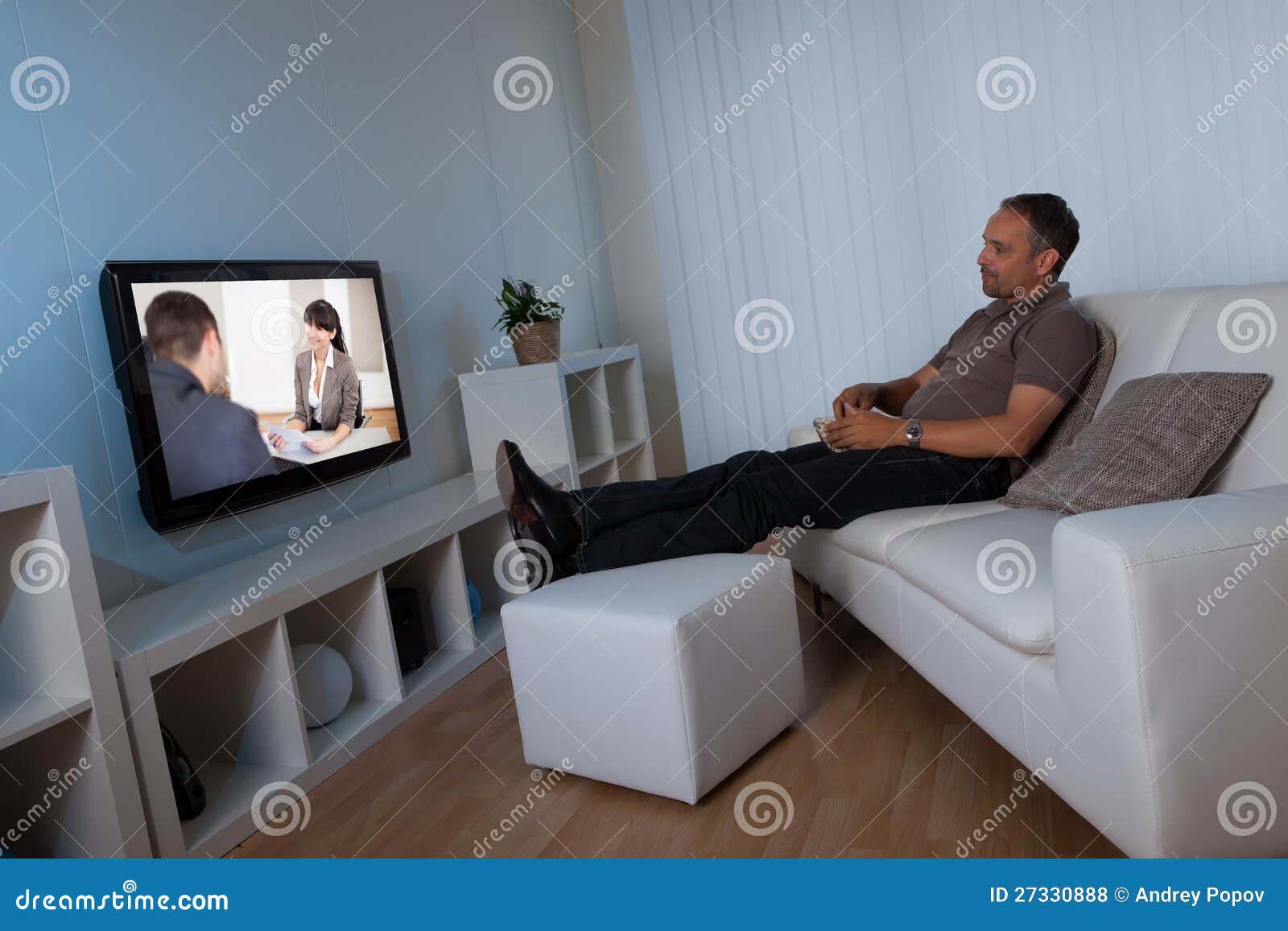 Man watching home movies stock photo. Image of male, definition - 27330888