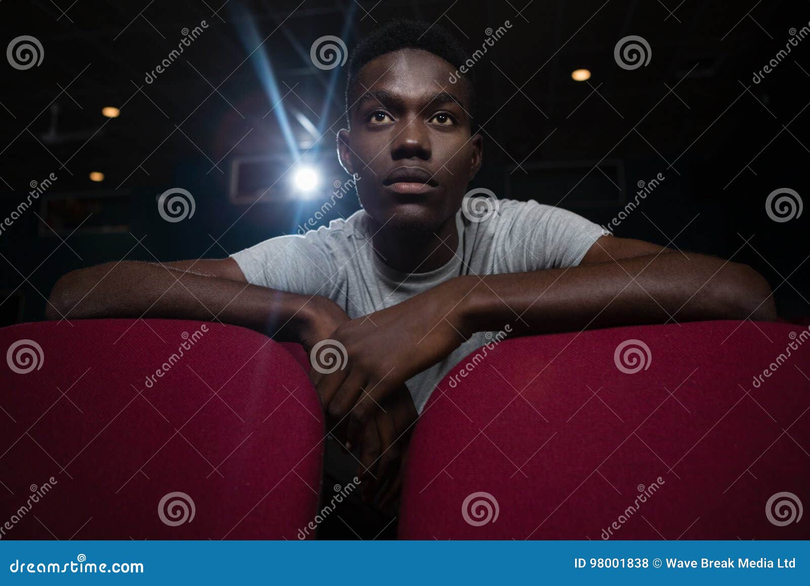 Man Watching Movie in Theatre Stock Photo - Image of cinema, industry ...