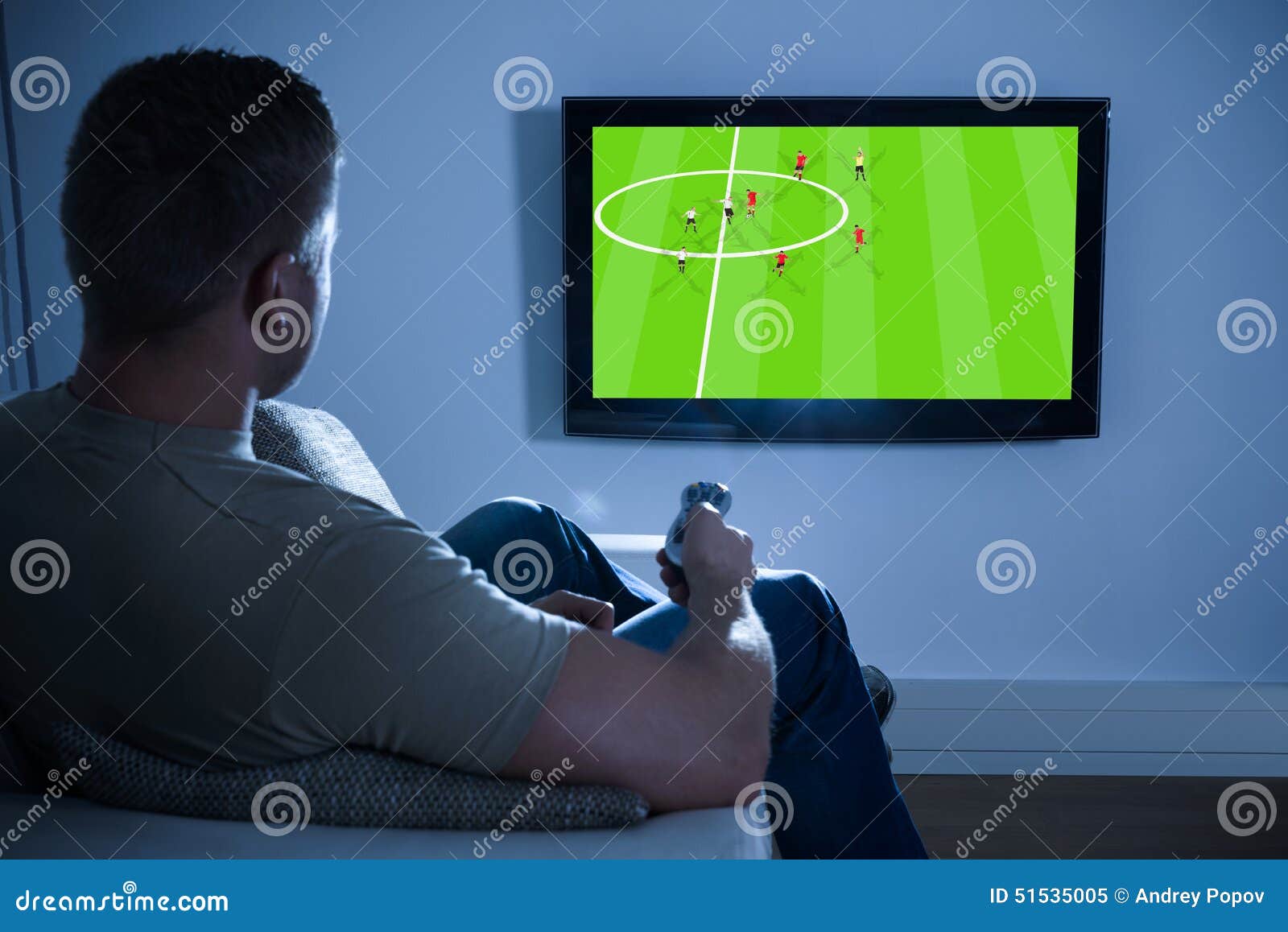 Man Watching Soccer Game on Television at Home Stock Image - Image of ...
