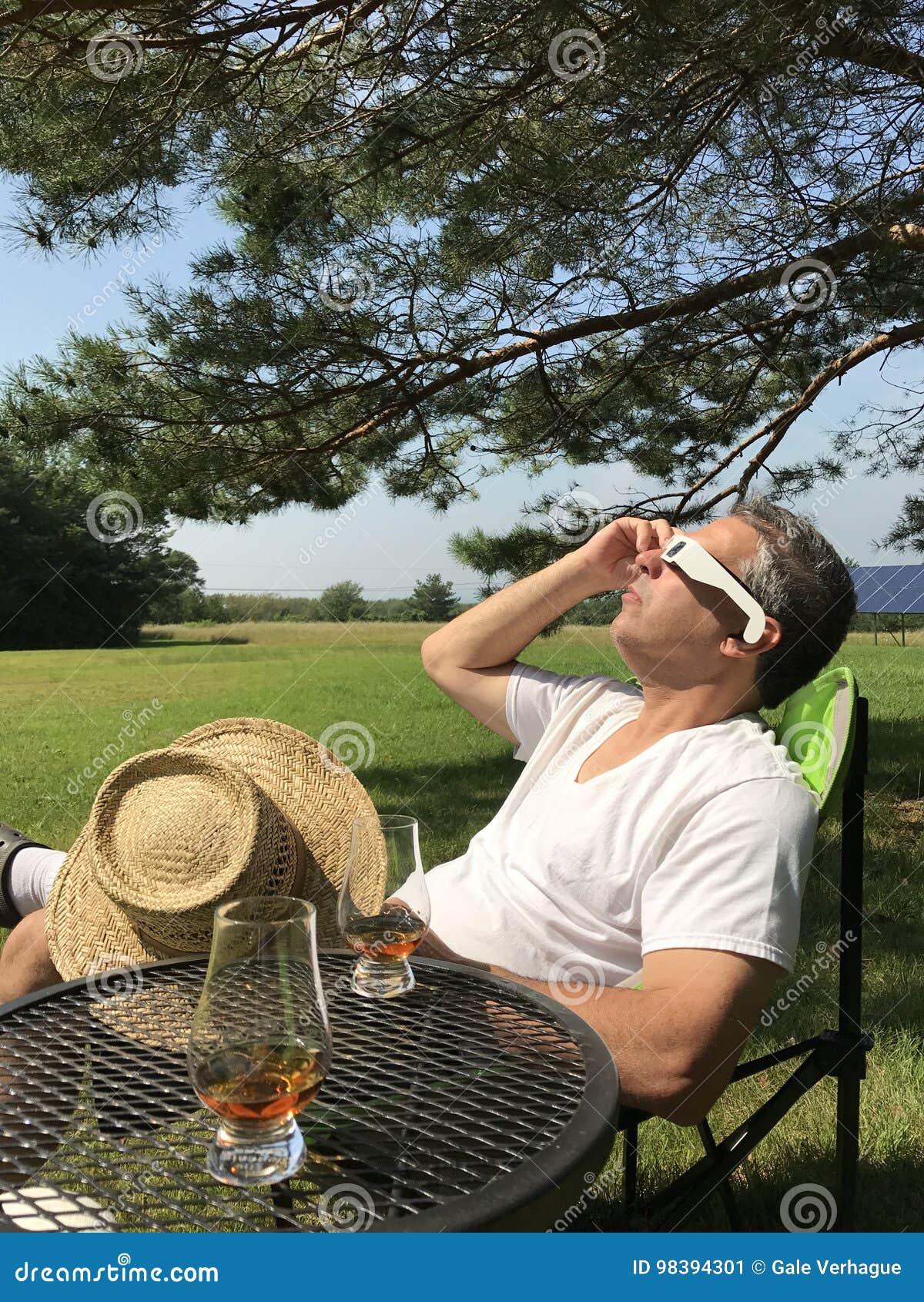 Man Watching Solar Eclipse stock image. Image of glasses - 98394301