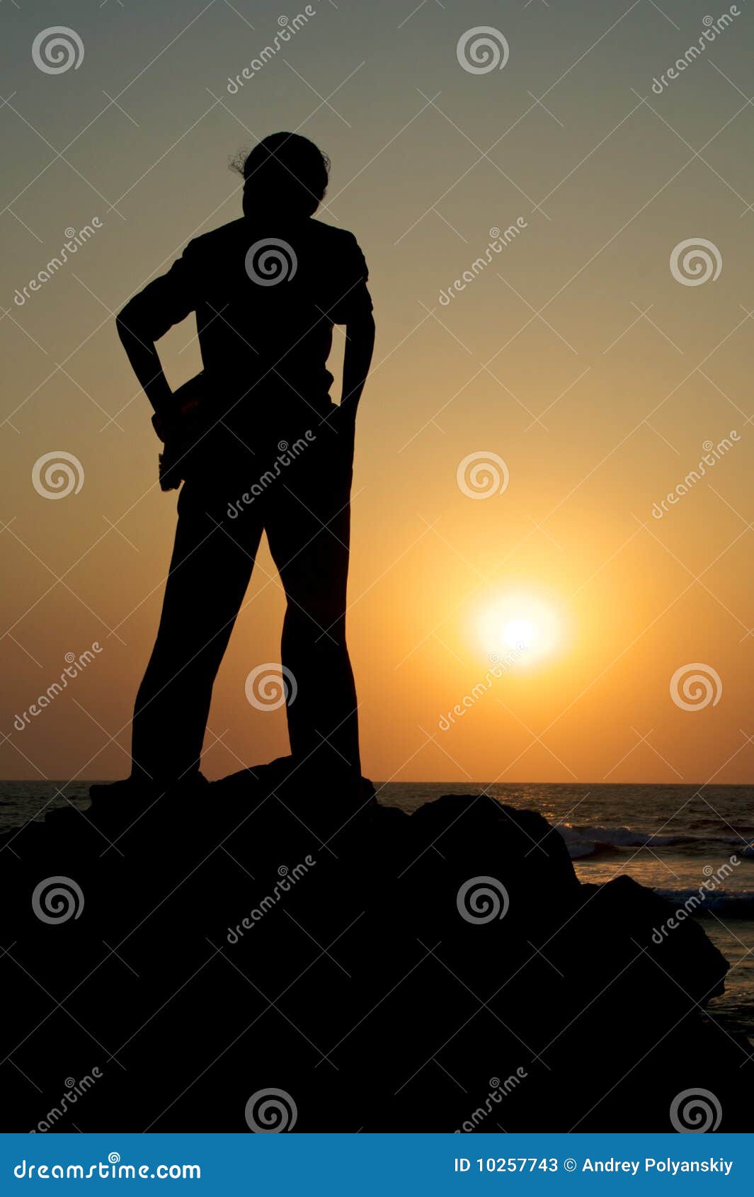 A man watching the sunset stock image. Image of horizon - 10257743