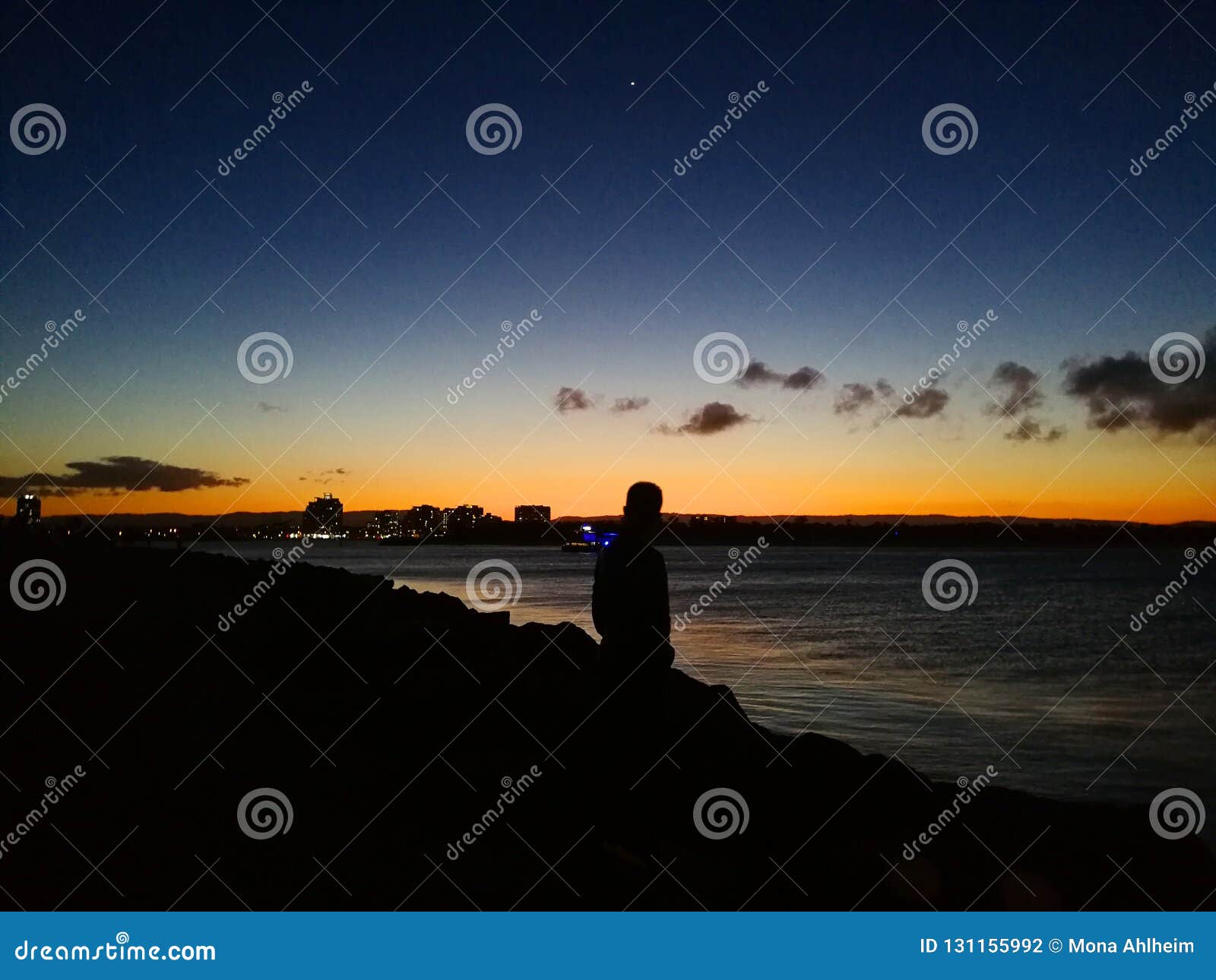 Lonely sunset stock photo. Image of gold, watching, sunset - 131155992