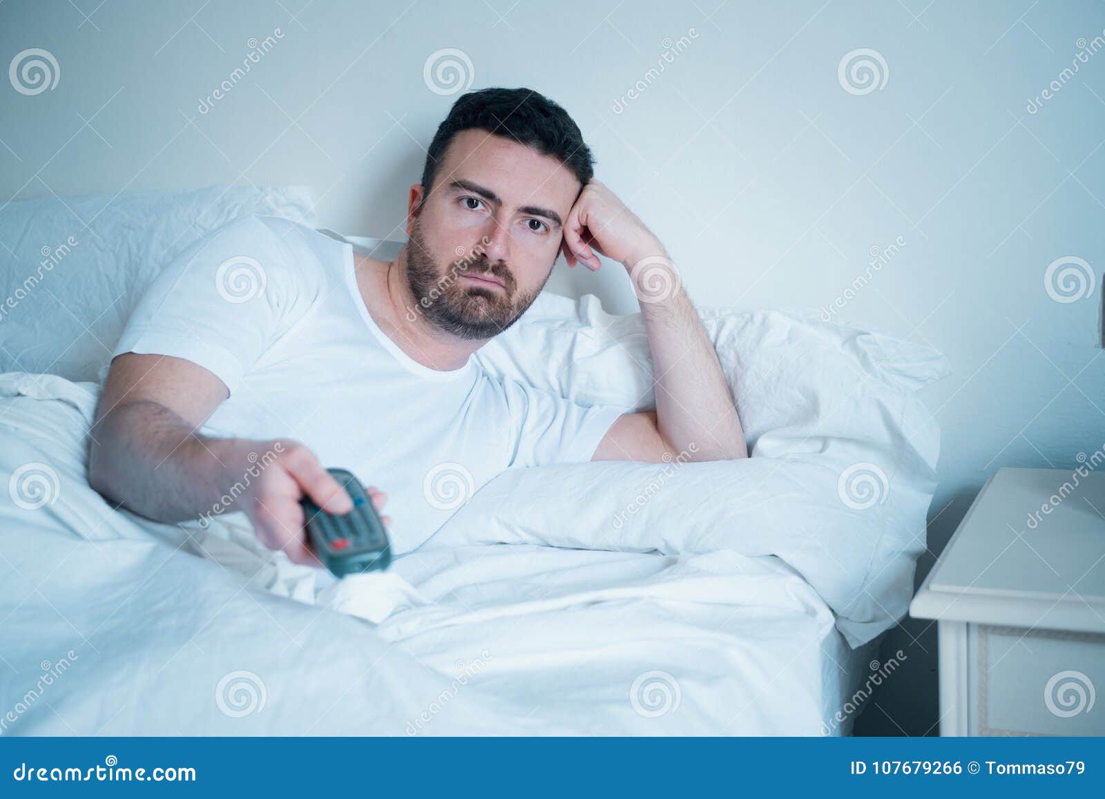 Man Watching Television Lying in Bed Stock Photo - Image of home ...